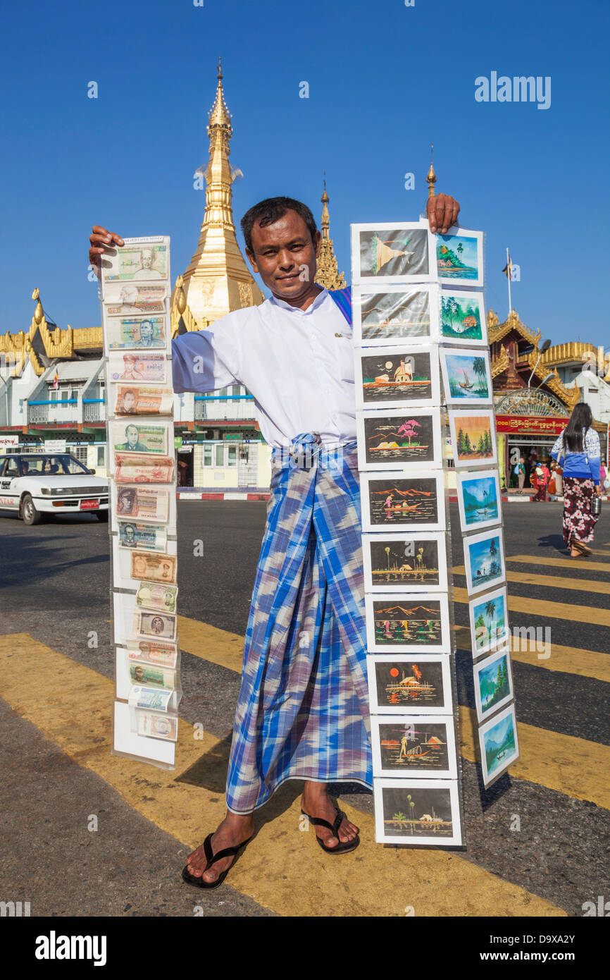 Street vendor selling souvenir postcard and banknote in front of the ...