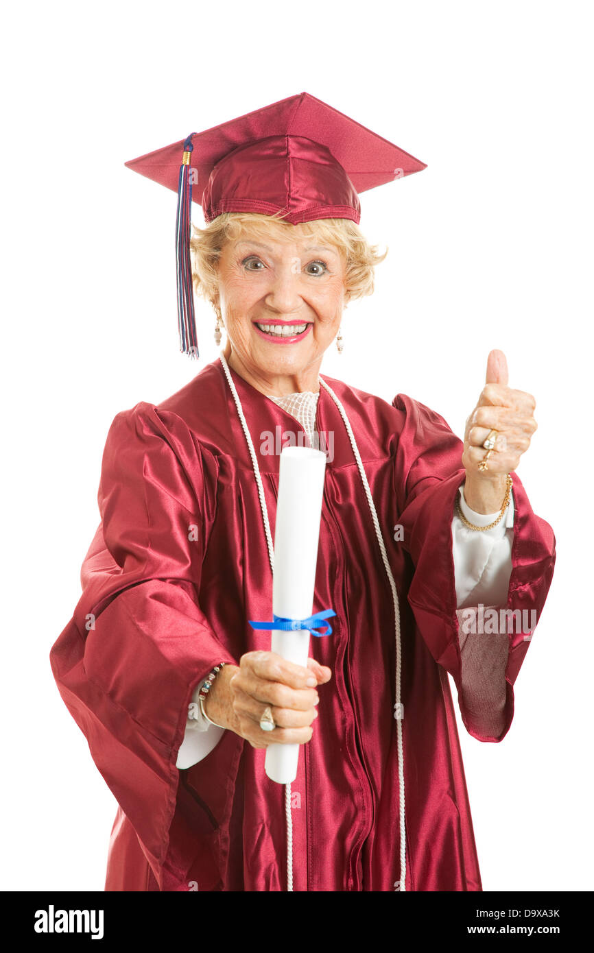 Happy senior lady graduates in her cap and gown, giving thumbs up Stock ...