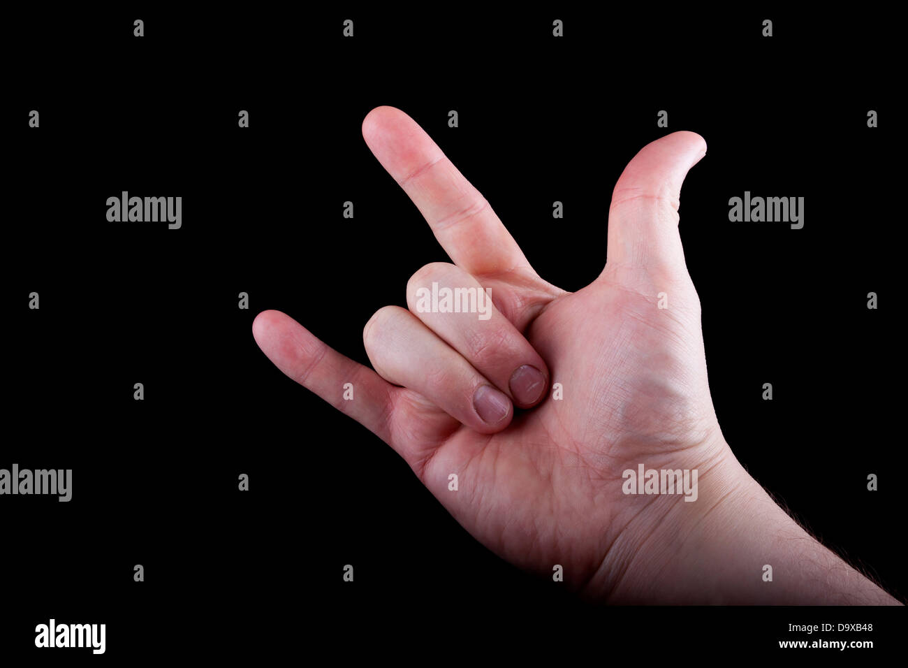 Hand sign showing i love you Stock Photo - Alamy
