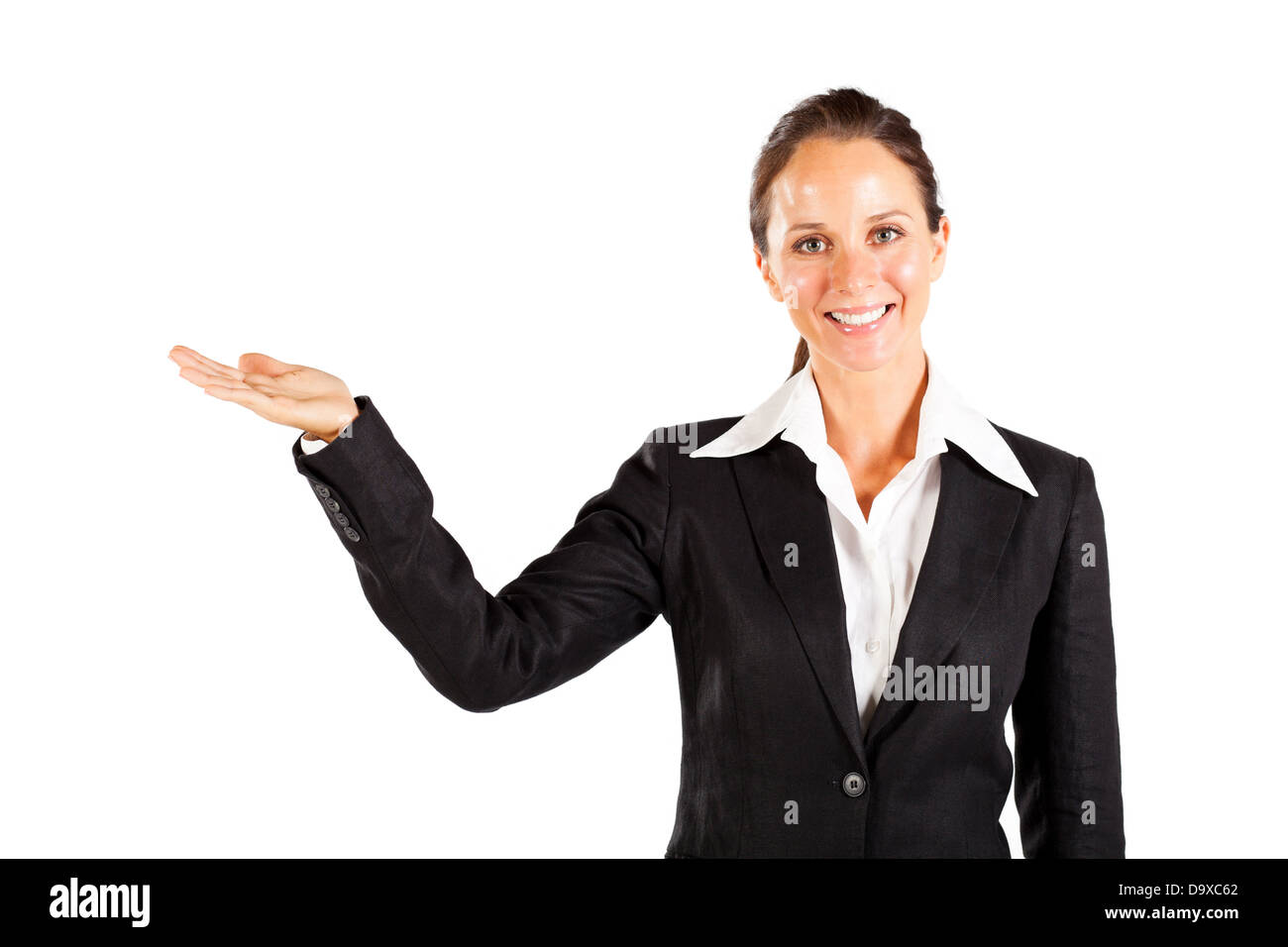 smiling businesswoman presenting on white Stock Photo - Alamy
