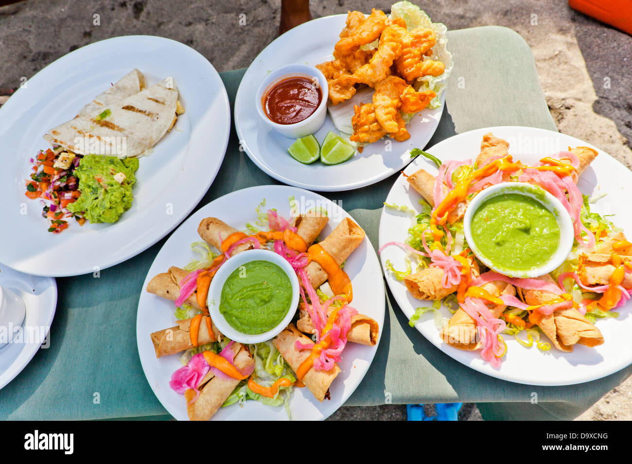 Plates of mexican food Stock Photo - Alamy