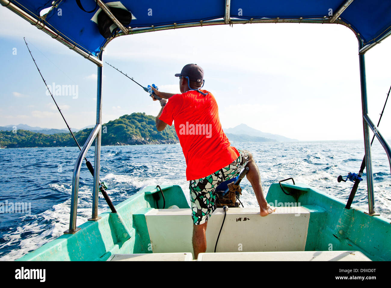 Black man fishing boat hi-res stock photography and images - Alamy
