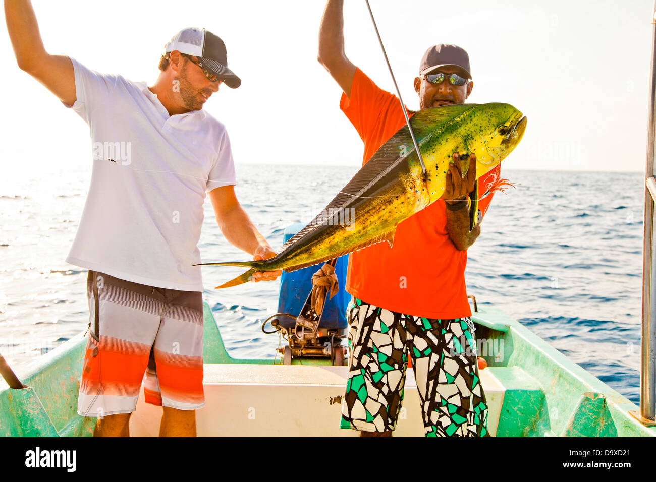 Men catch fish on lake hi-res stock photography and images - Alamy