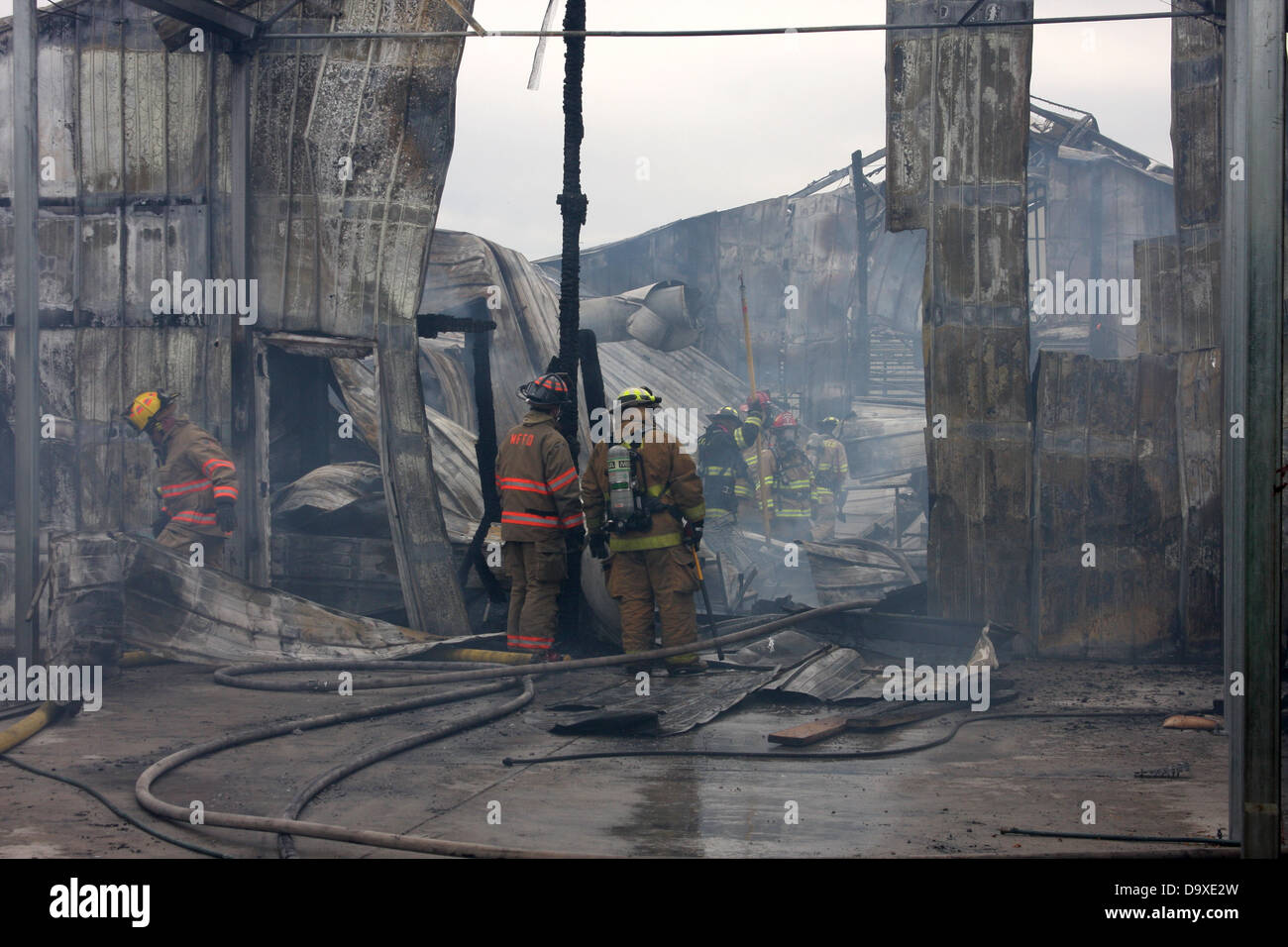 Firefighters at a scene of a fire in Wisconsin Stock Photo - Alamy