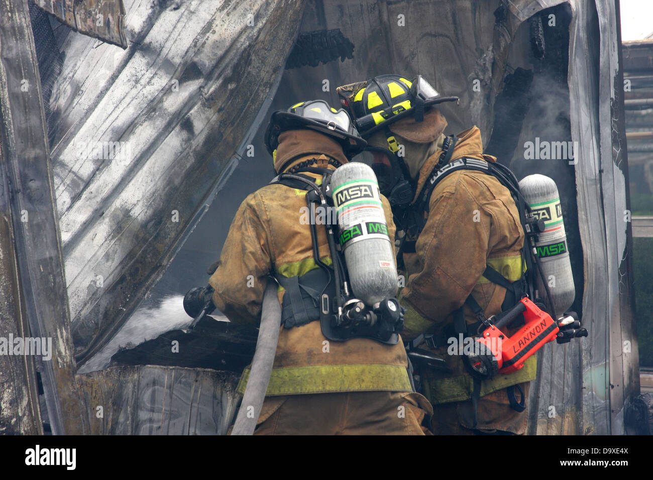 Putting Out Fire High Resolution Stock Photography and Images - Alamy