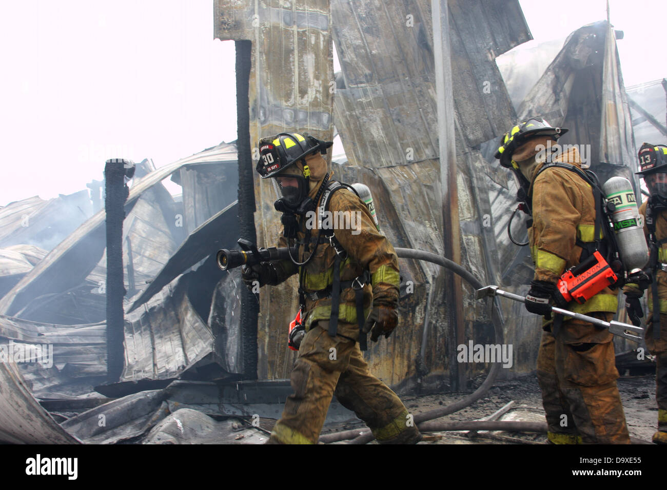 Three firefighters hi-res stock photography and images - Alamy