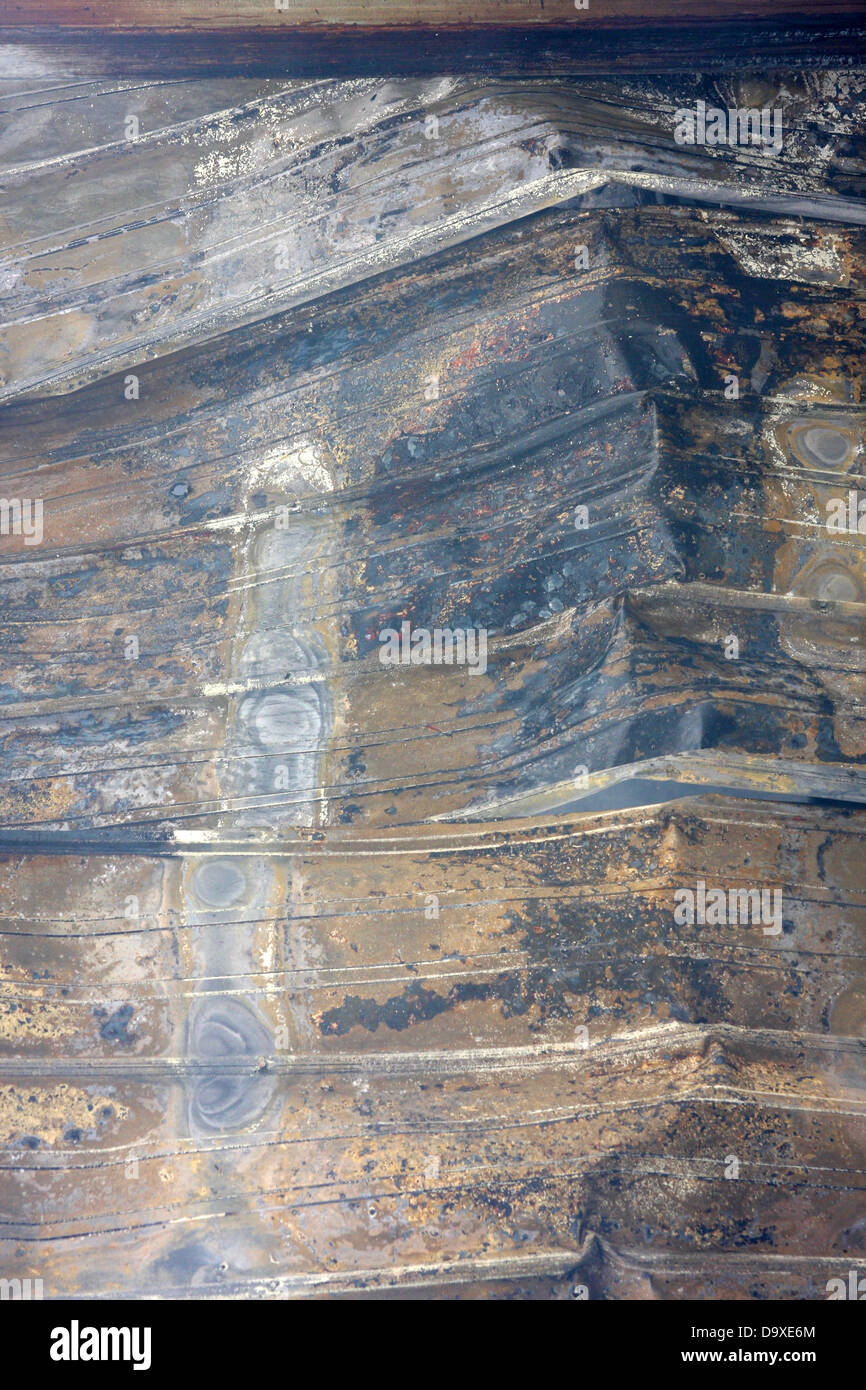 Burnt sheet metal at a fire scene Stock Photo - Alamy