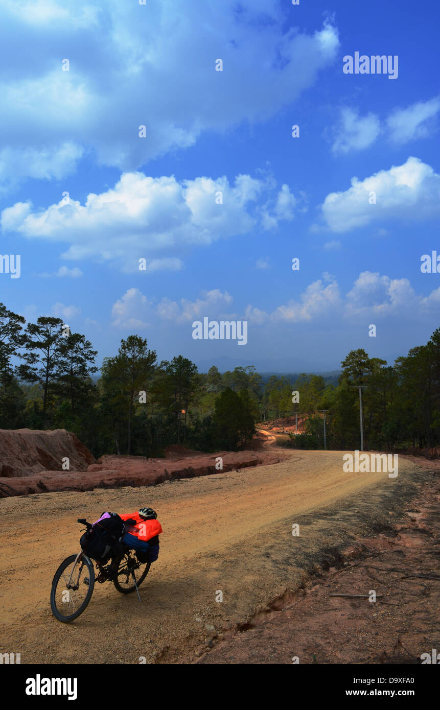 The Bicycle on Non Asphalt Paved Road Stock Photo - Alamy