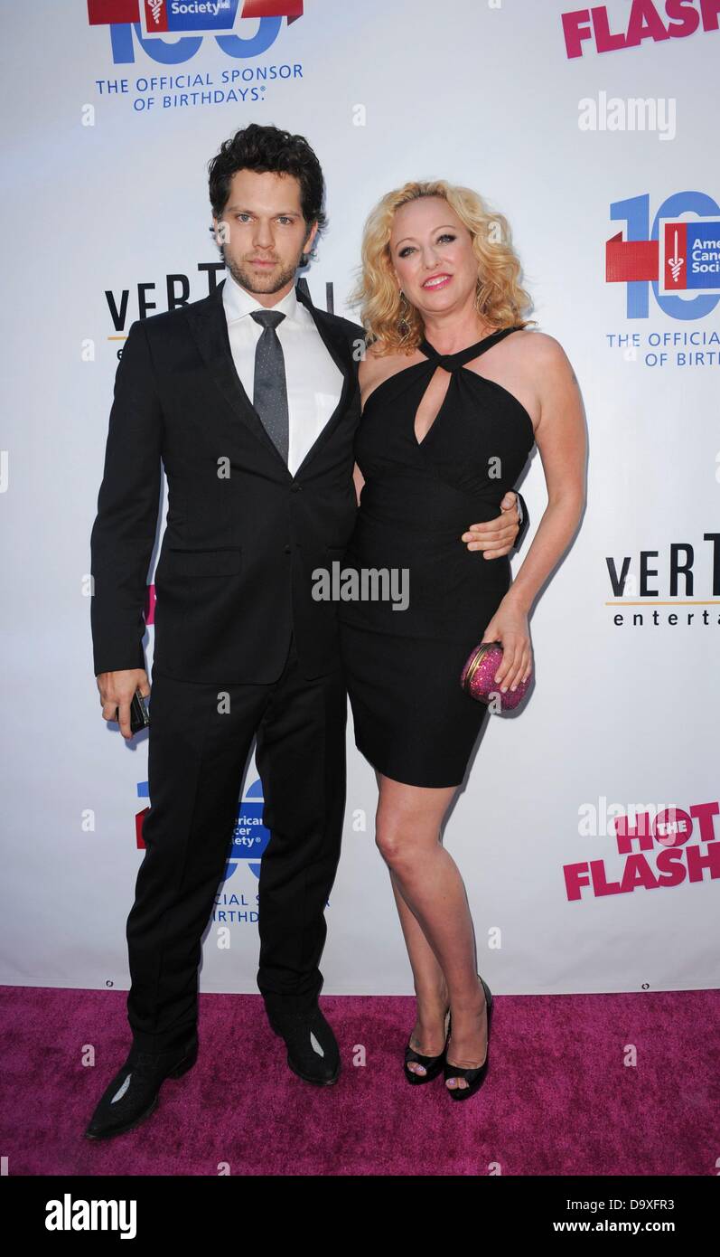 Los Angeles, CA. 27th June, 2013. Nick Holmes, Virginia Madsen at ...