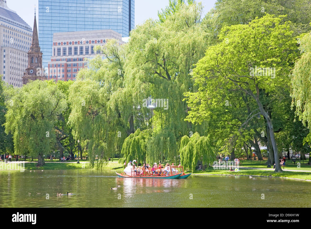 Swan Boat with tourists in Public Garden and Boston Common in summer ...