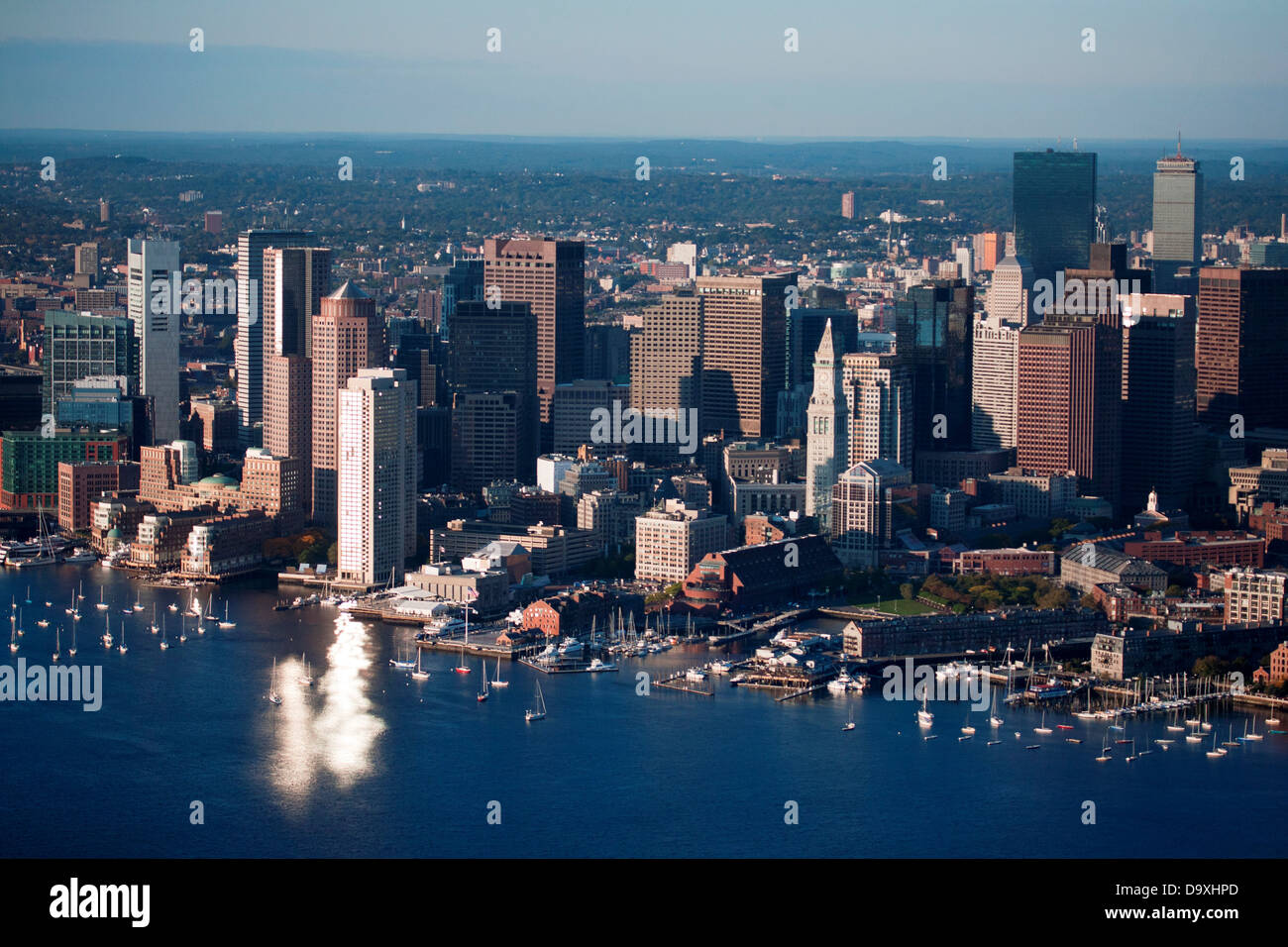 AERIAL VIEW of Wind Turbine and Tug Boat pushing red barge, Boston ...