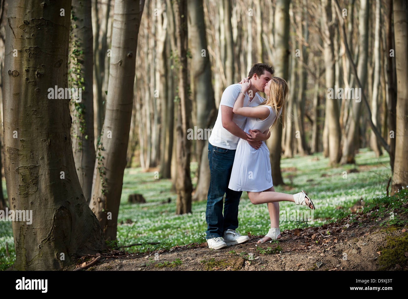 Germany, Rhineland Palatinate, Young couple kissing Stock Photo - Alamy