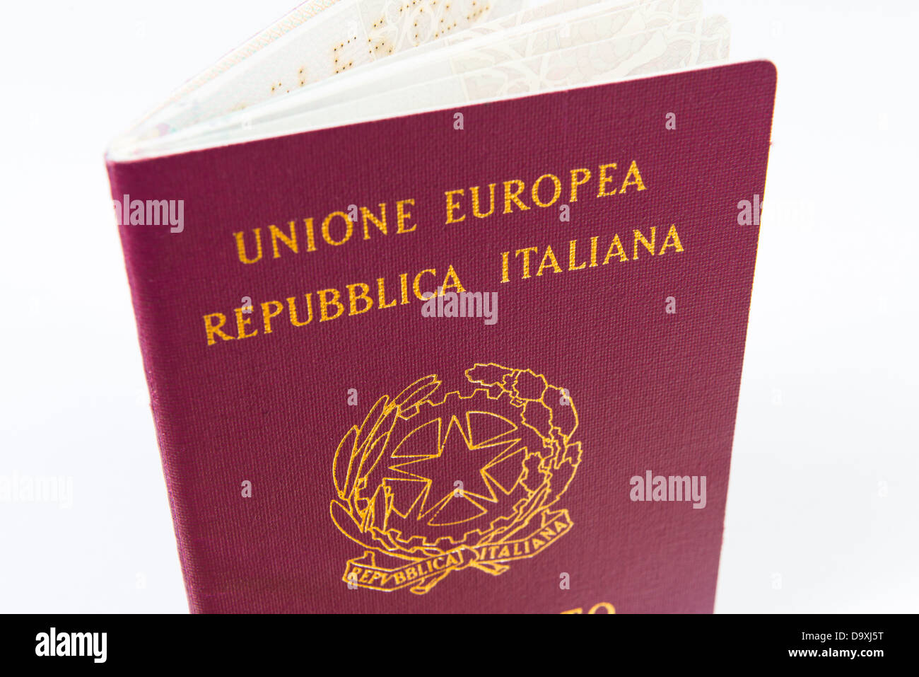 High angle shot of Italian passport standing on white background Stock ...