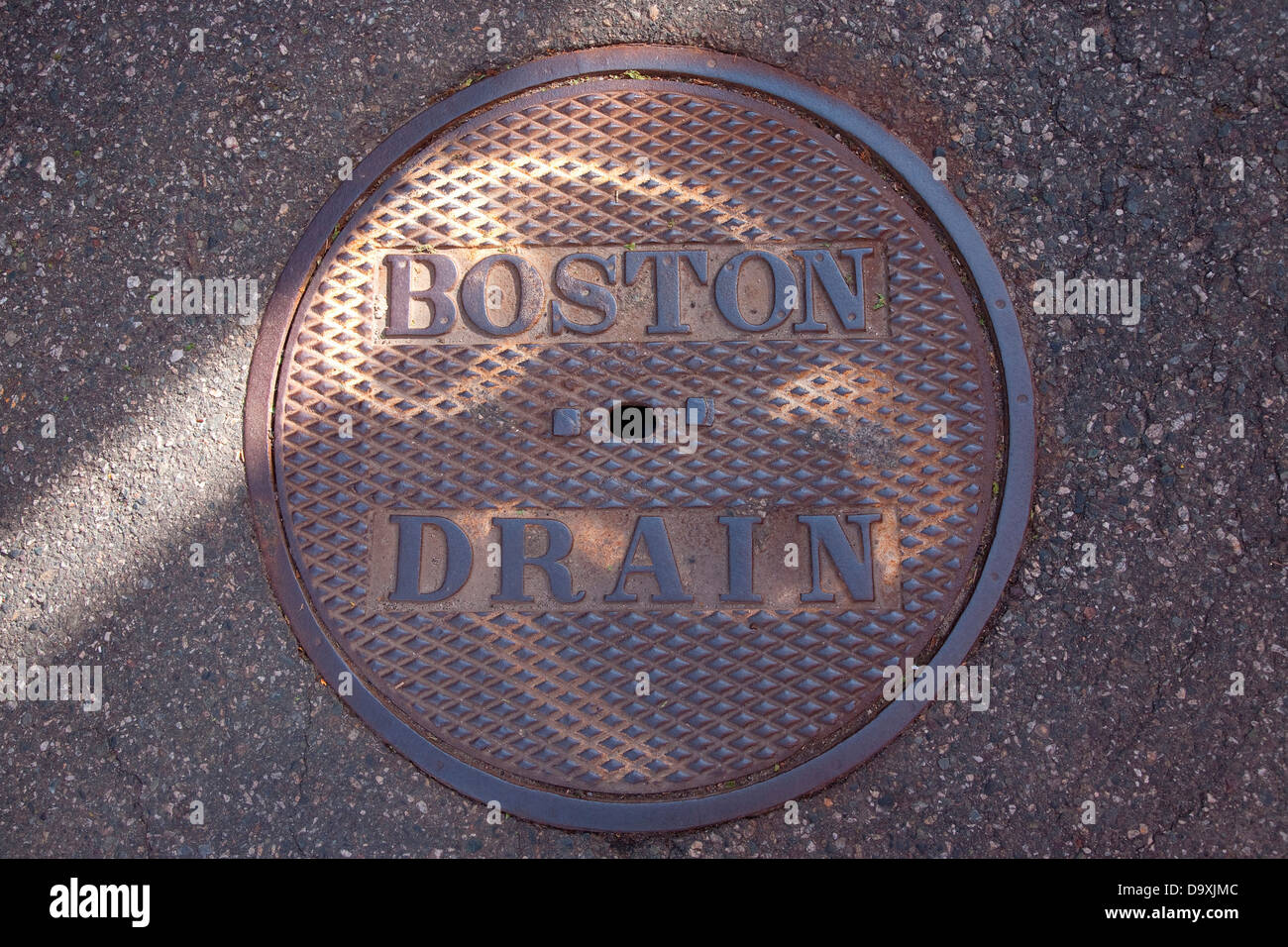 Boston Sewer Drain circular lid, Boston, MA Stock Photo - Alamy