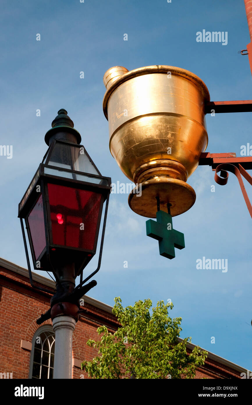 Gaslight and symbol for RX pharmacy on Hanover Street, historic North ...