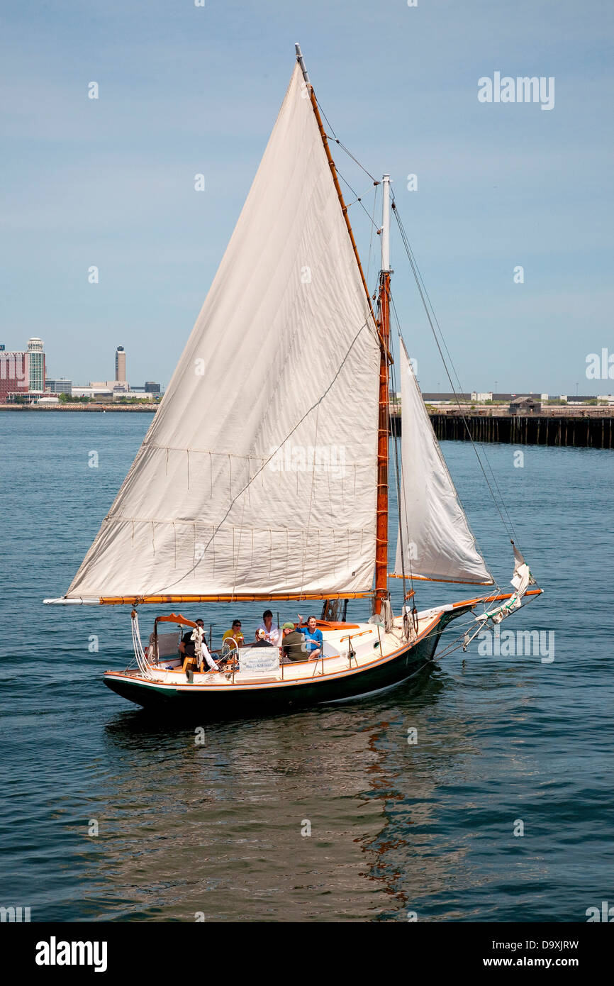 Small sail boat sailing in Boston Harbor, Boston, MA Stock Photo - Alamy