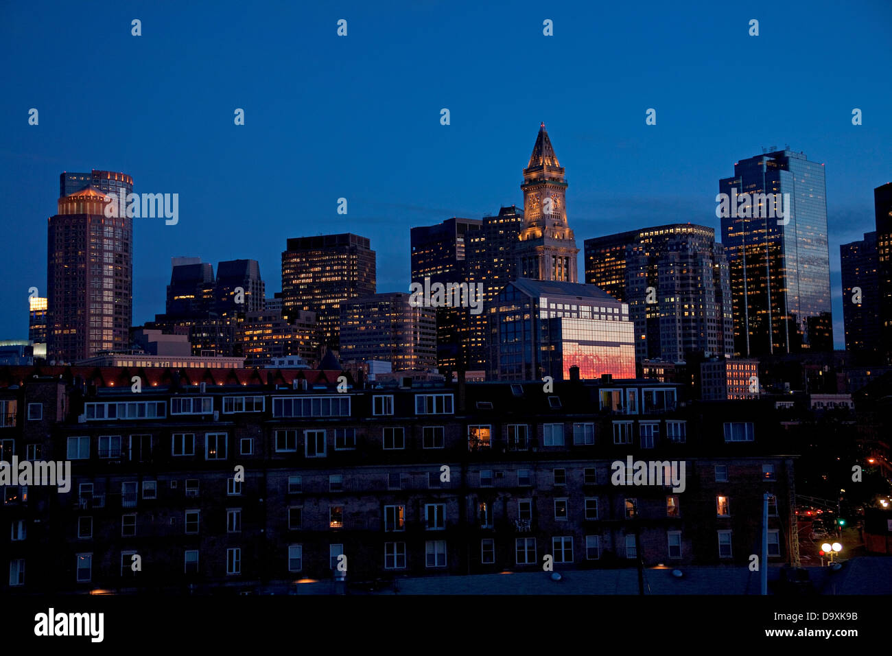 Sunset reflects in windows of Boston skyline Commerce House Tower shot ...