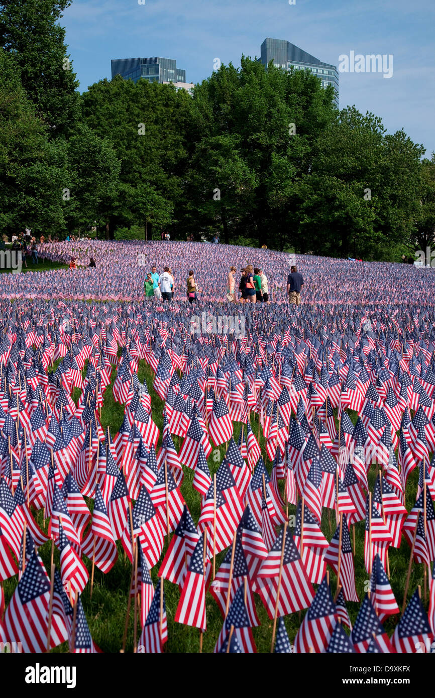 People walk through 20,000 American Flags that are displayed for every ...