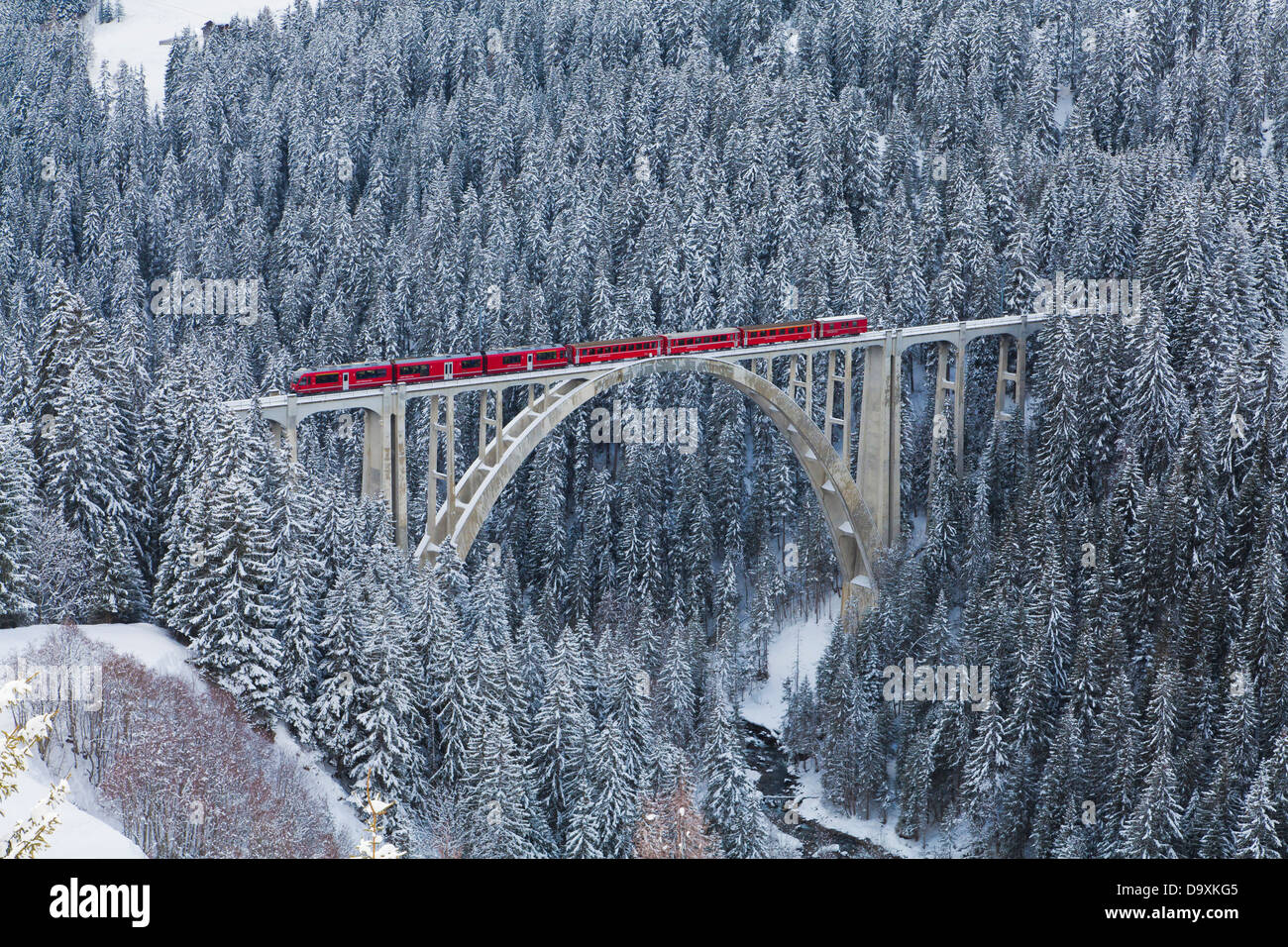 Switzerland, Rhaetian railway passing through Langwieser Viaduct bridge ...