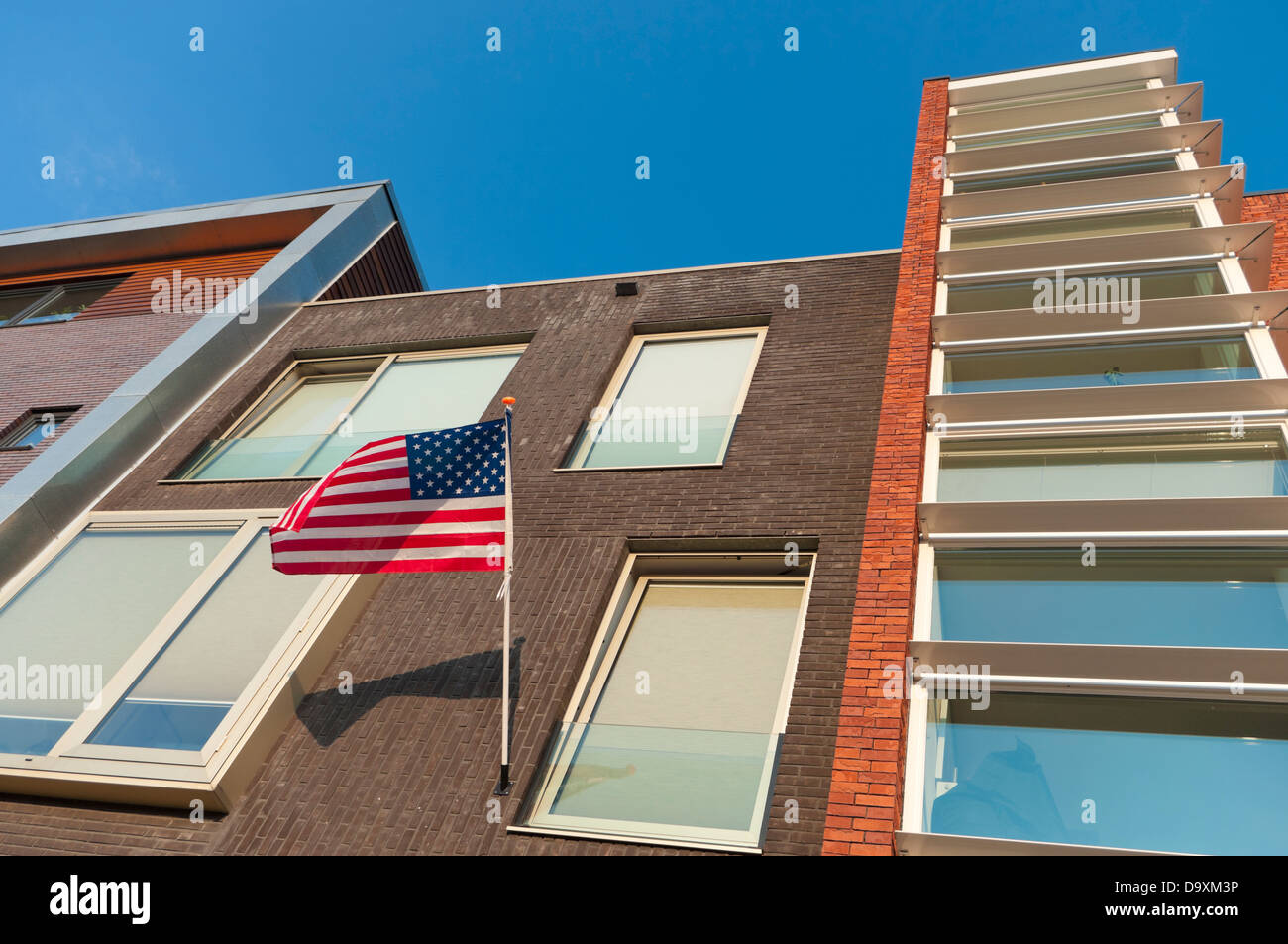American flag hanging outside house hi-res stock photography and images ...