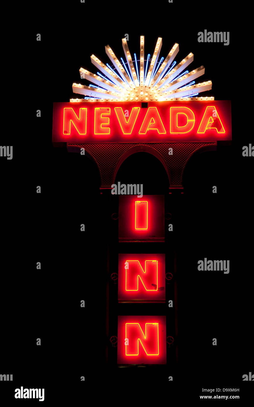 Red neon sign saying 'Nevada Inn' Stock Photo - Alamy