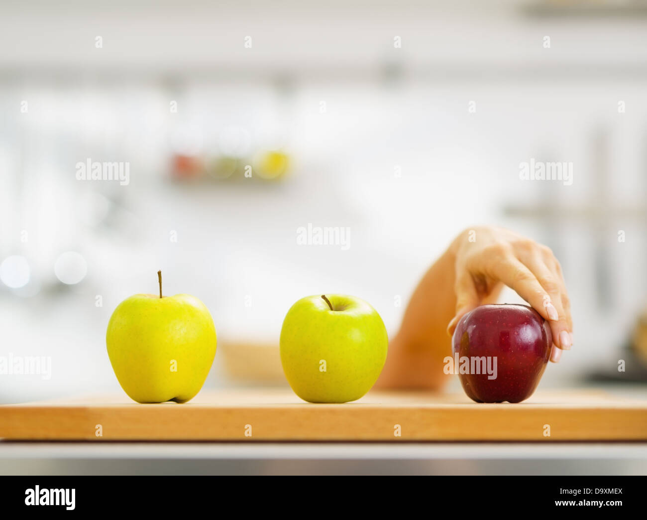 Choosing red apple green apple hi-res stock photography and images - Alamy