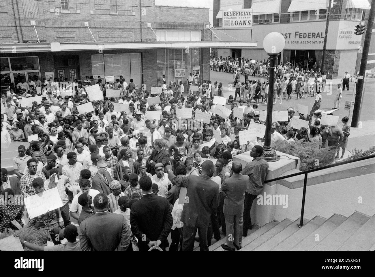 A photograph capturing the moment of a march led by Dr. Martin Luther ...