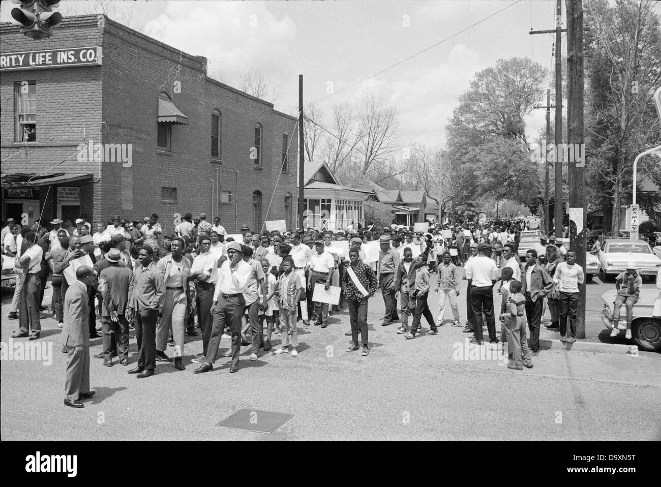 This image captures a moment from a march led by Dr. Martin Luther King ...