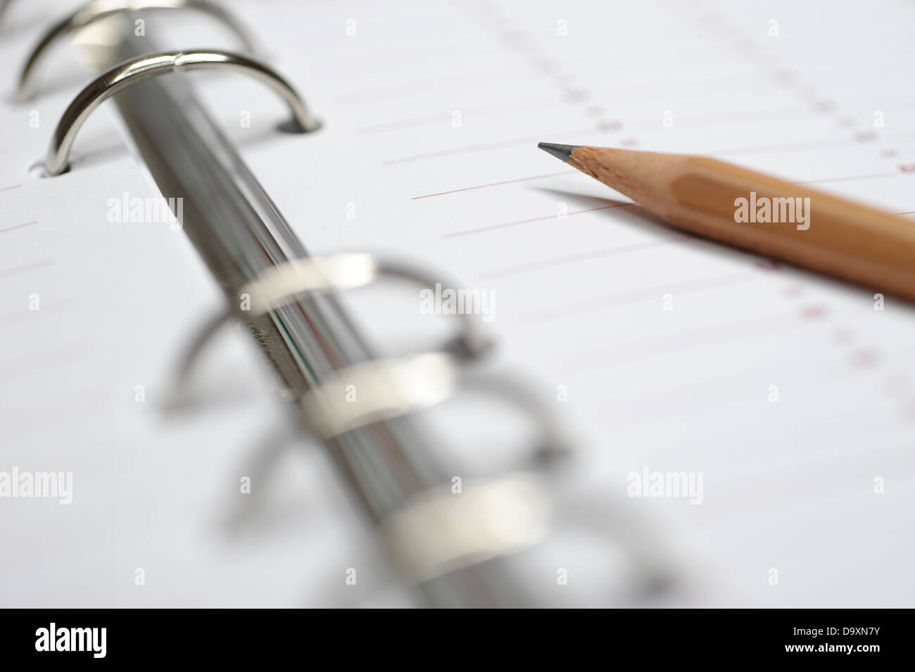 schedule planner and pencil Stock Photo - Alamy