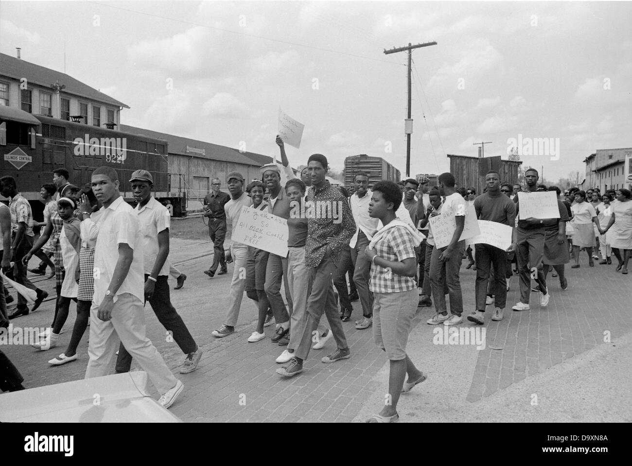 This photograph captures a moment from the civil rights march led by Dr ...