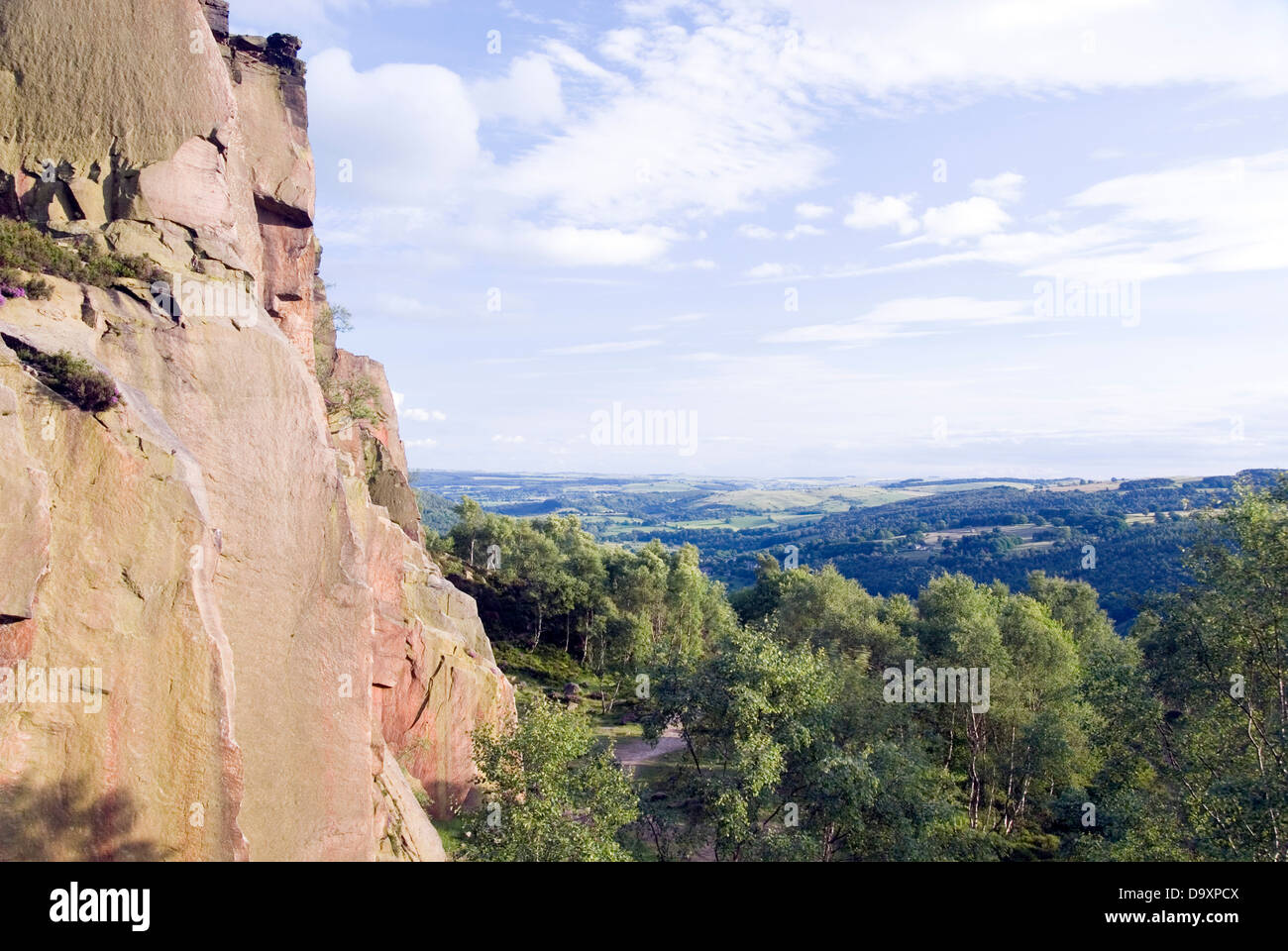 Millstone Edge, a sheer cliff face jutting out of the Peak District ...