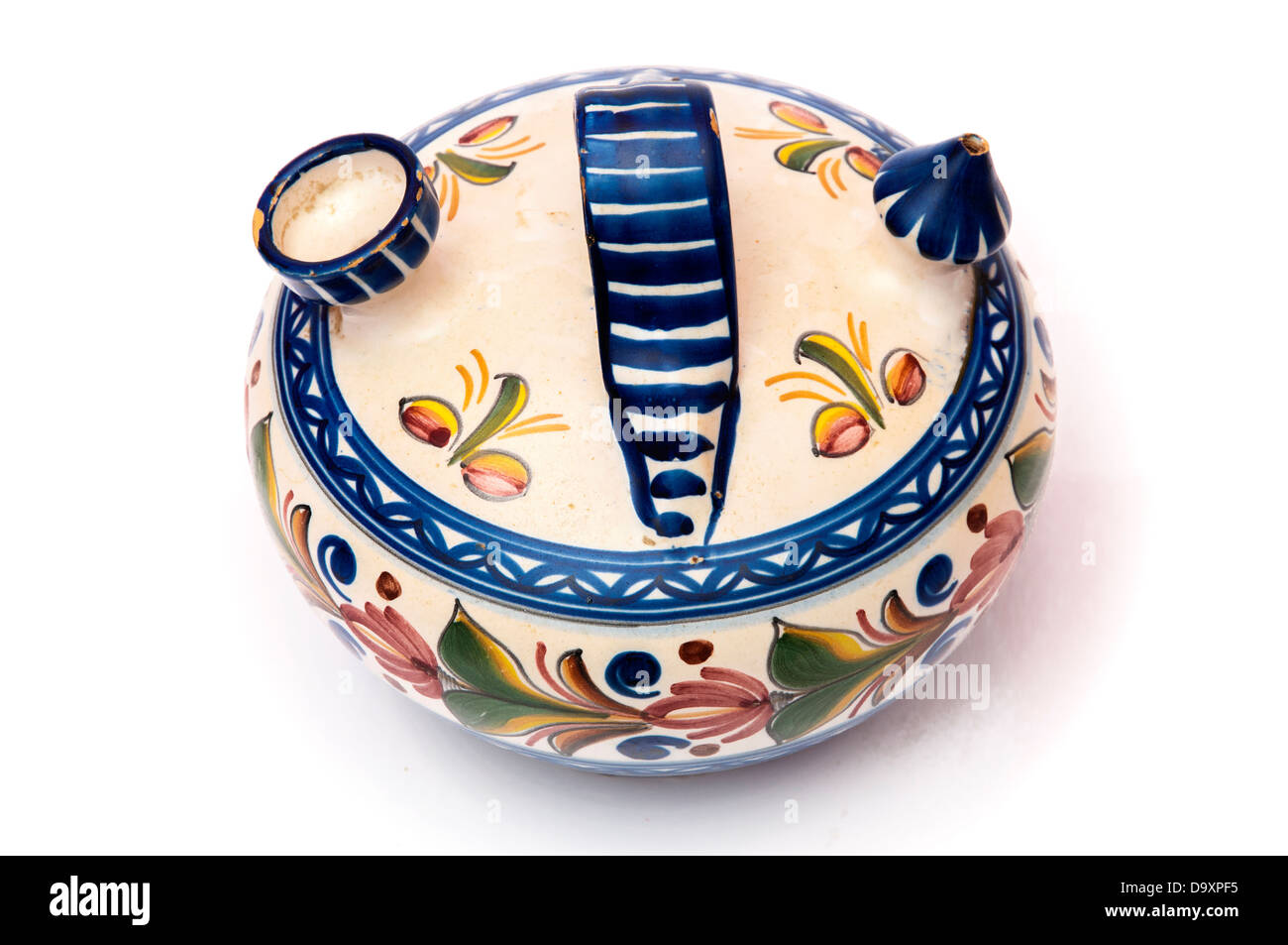 jug of colors on a white background Stock Photo - Alamy