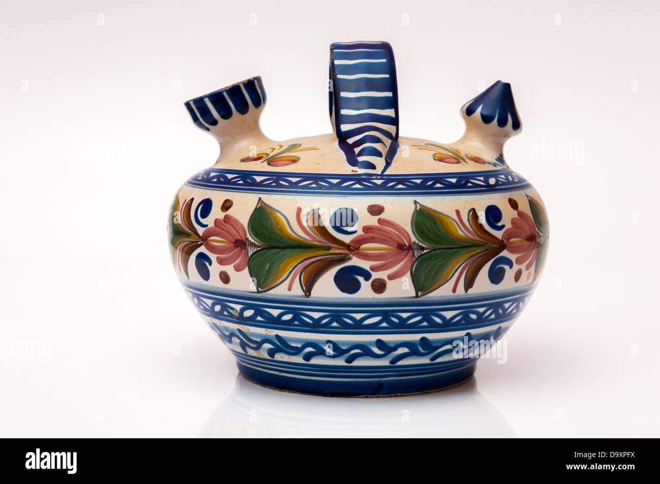 jug of colors on a white background Stock Photo - Alamy