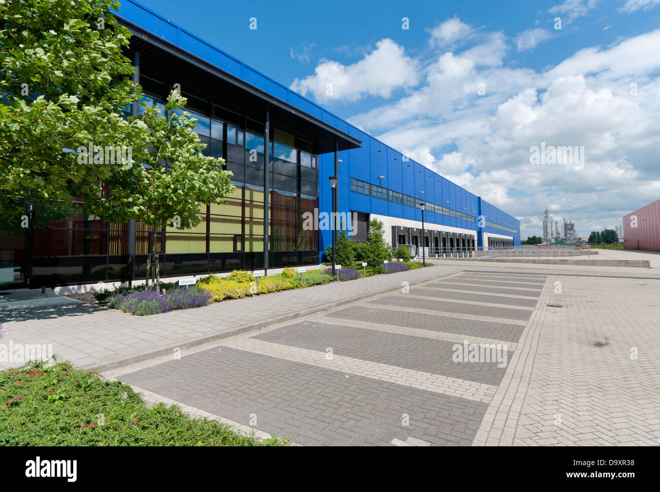 modern blue warehouse in the Rotterdam harbor area Stock Photo - Alamy