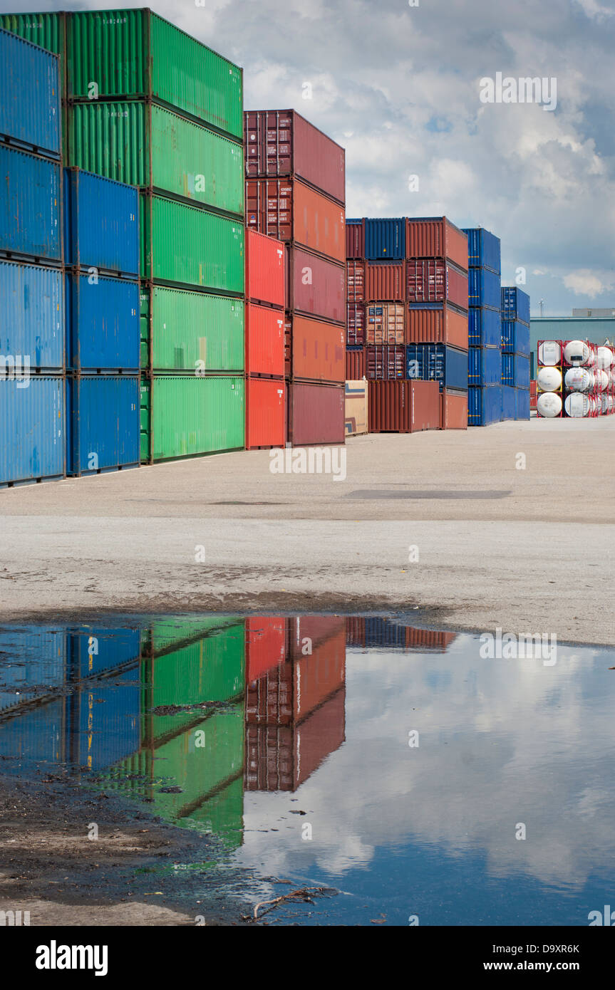 cargo containers on a large storage area in the Rotterdam harbor area ...