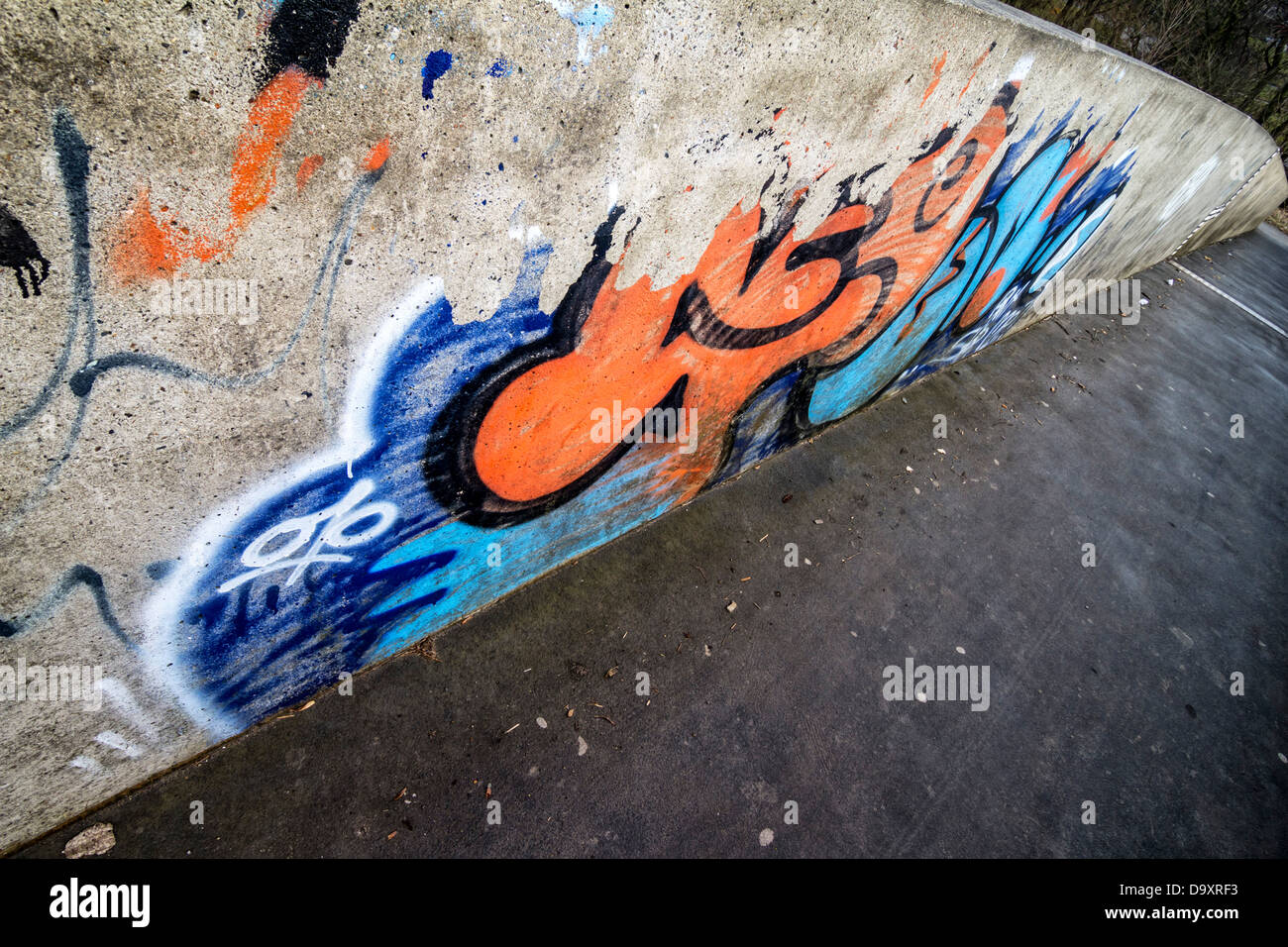 worn out graffiti on a wall along a public pedestrian bridge Stock ...
