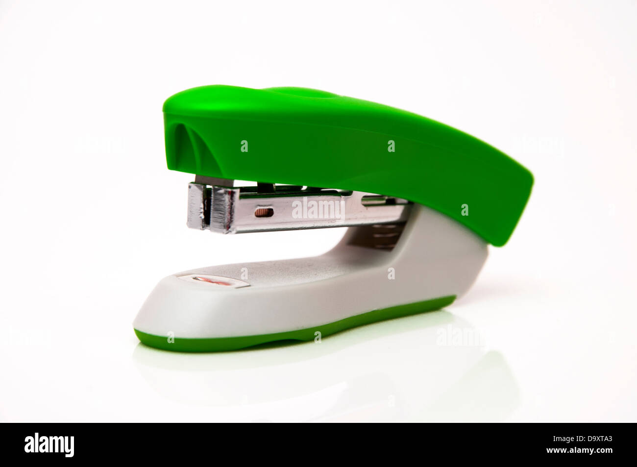 green stapler on a white background Stock Photo - Alamy