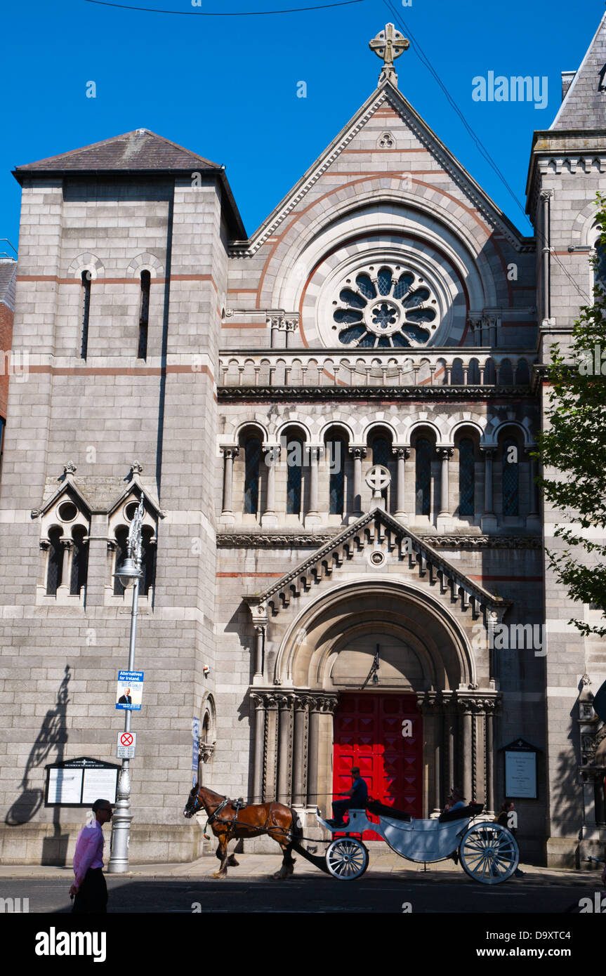 Horse drawn carriage in front of St Ann's church Dawson Street central ...