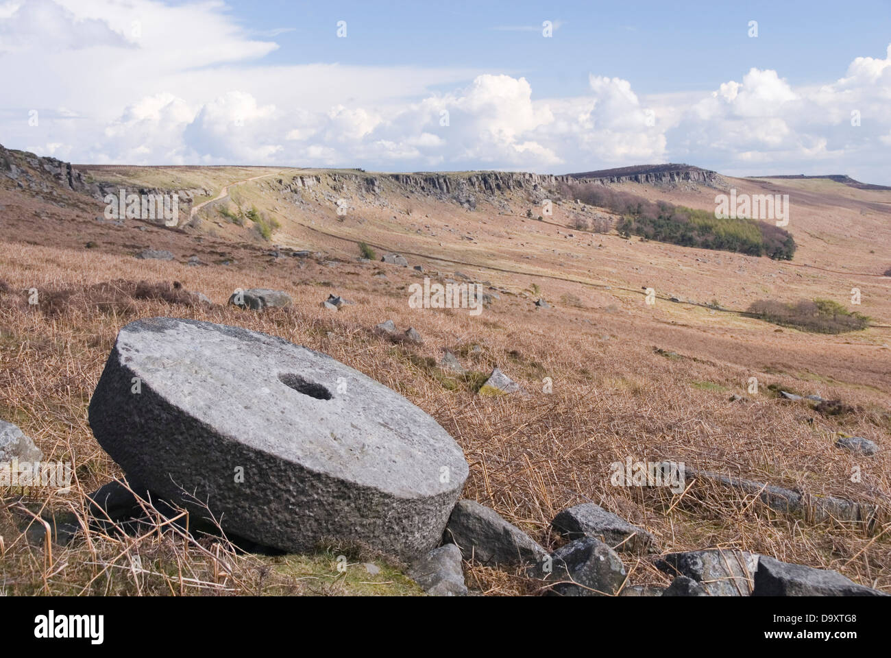 Millstone lying abandoned in situ at the old quarry site at Stanage ...