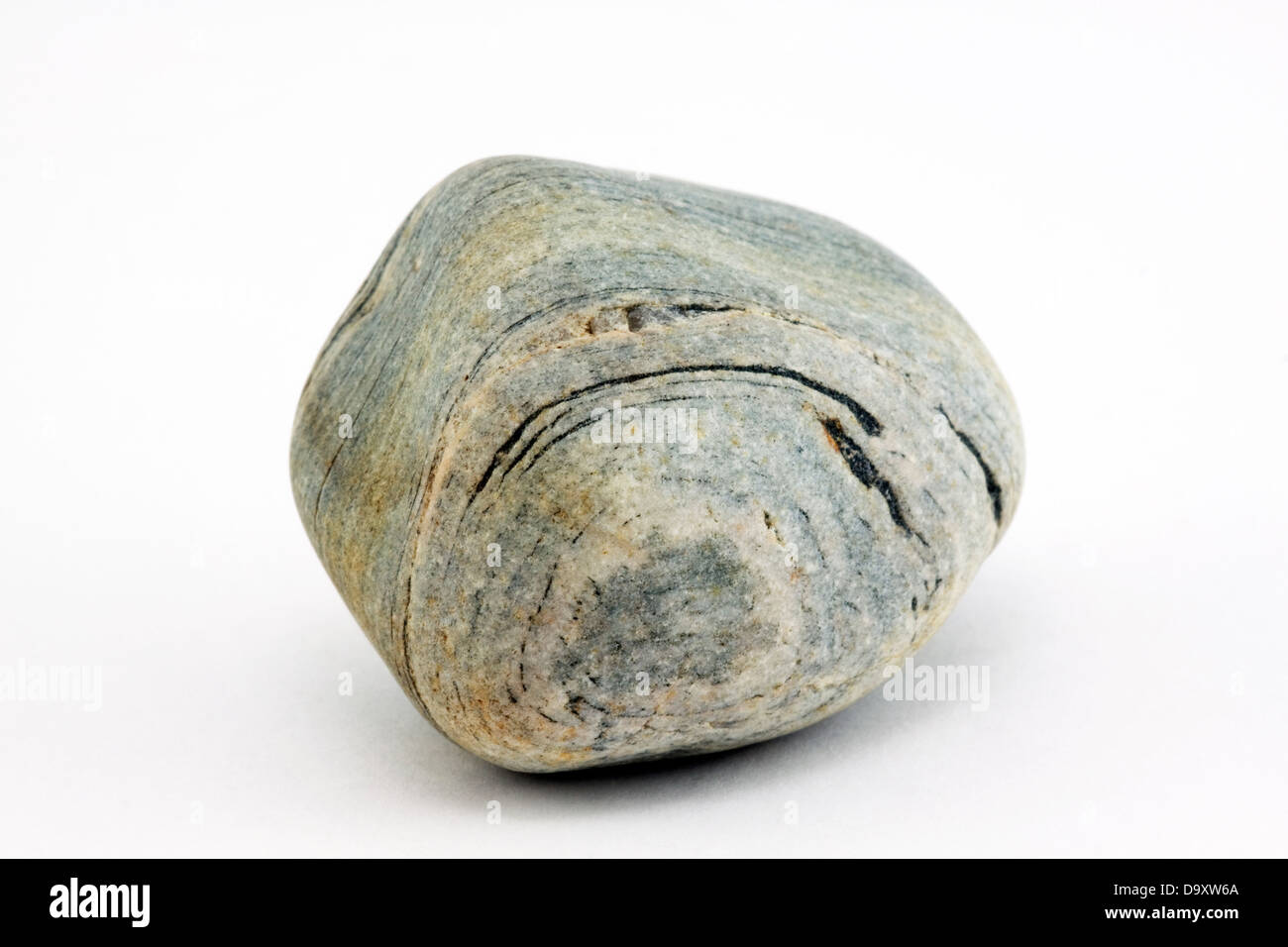 single stone isolated on white Stock Photo - Alamy