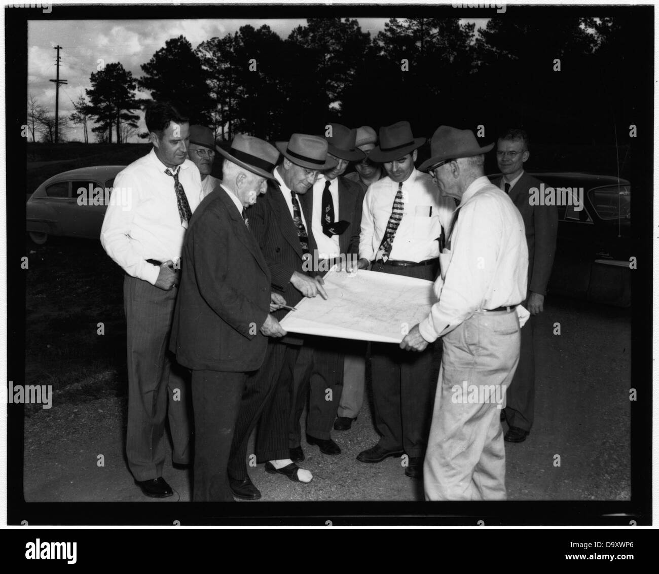 This image shows officials mapping the expansion of Brookhaven in 1950 ...