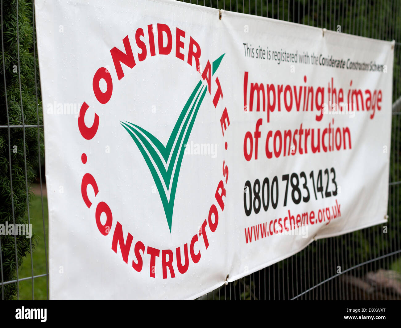 Considerate construction sign at a building site Stock Photo - Alamy