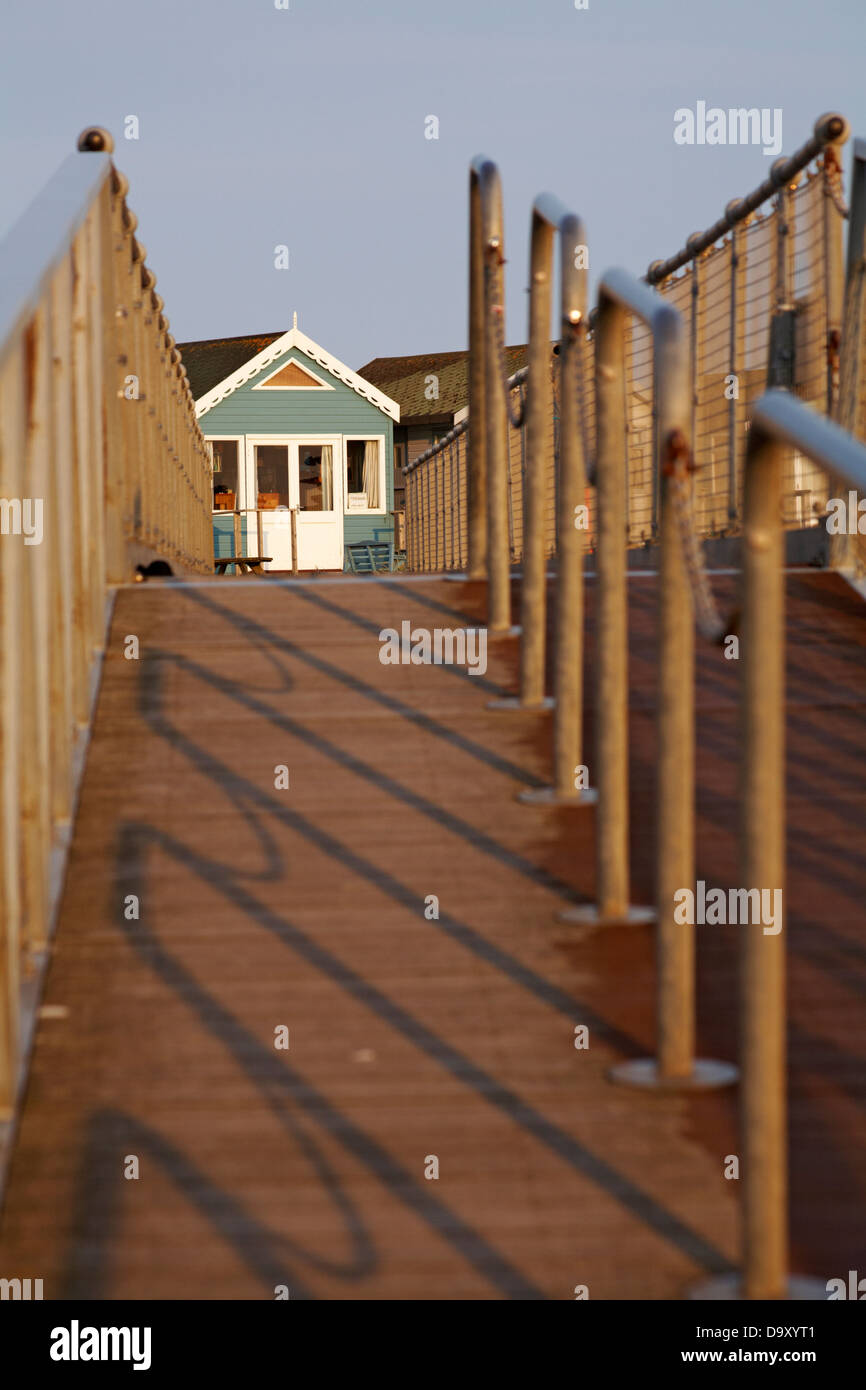 looking along jetty at beach hut for sale at Hengistbury Head, Dorset ...
