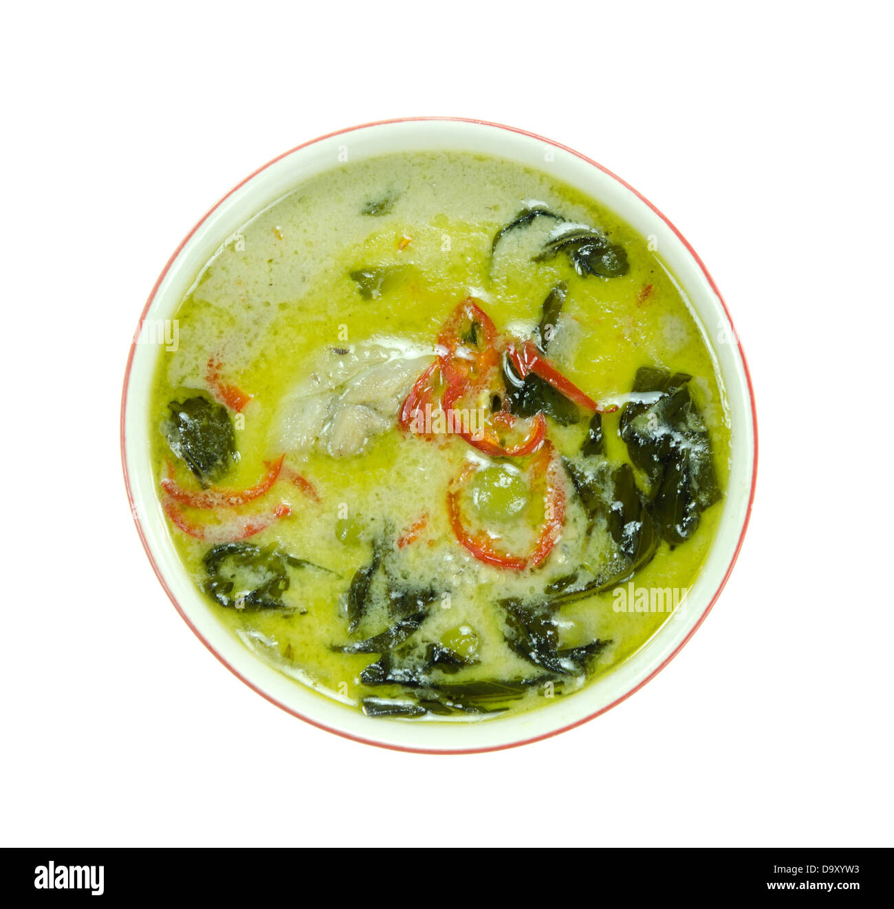 top view green chicken curry in bowl over white background Stock Photo ...
