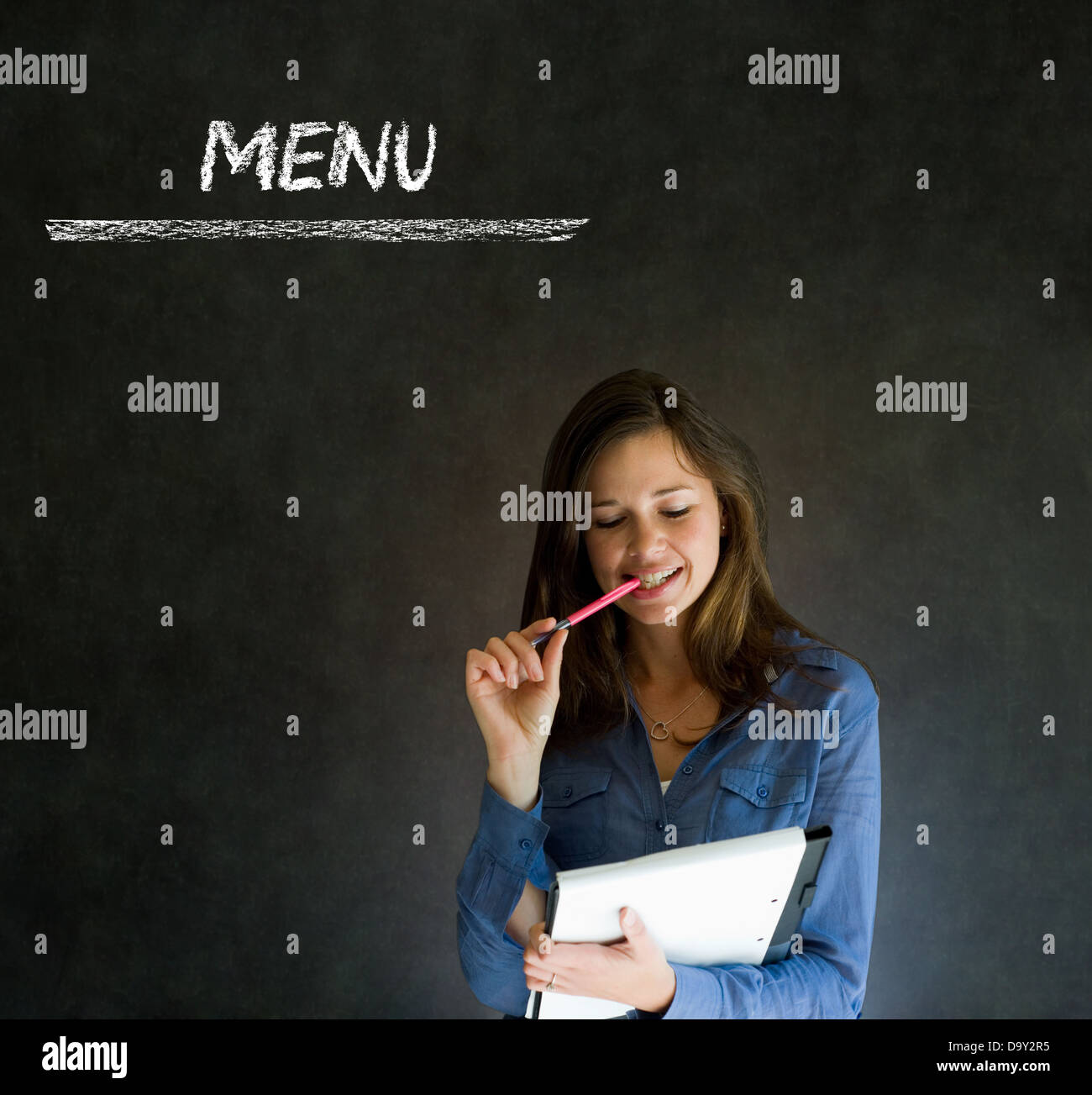 Businesswoman, restaurant owner or chef with chalk menu sign blackboard ...