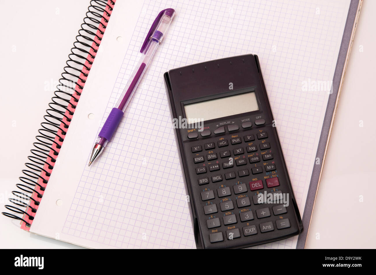 calculator notebook with notes on a white background Stock Photo - Alamy