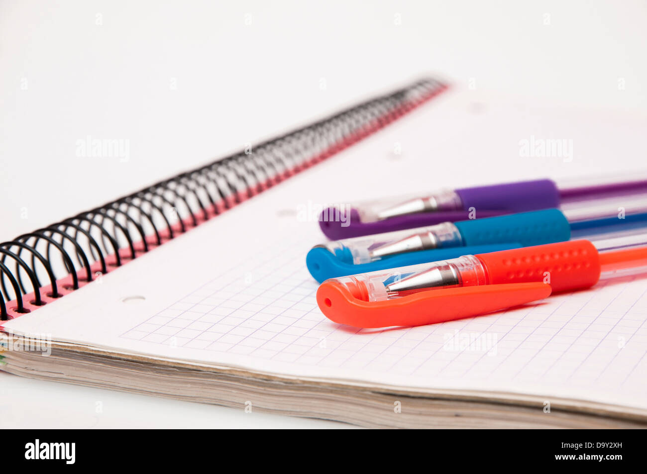 notepad with pens for notes on a white background Stock Photo - Alamy