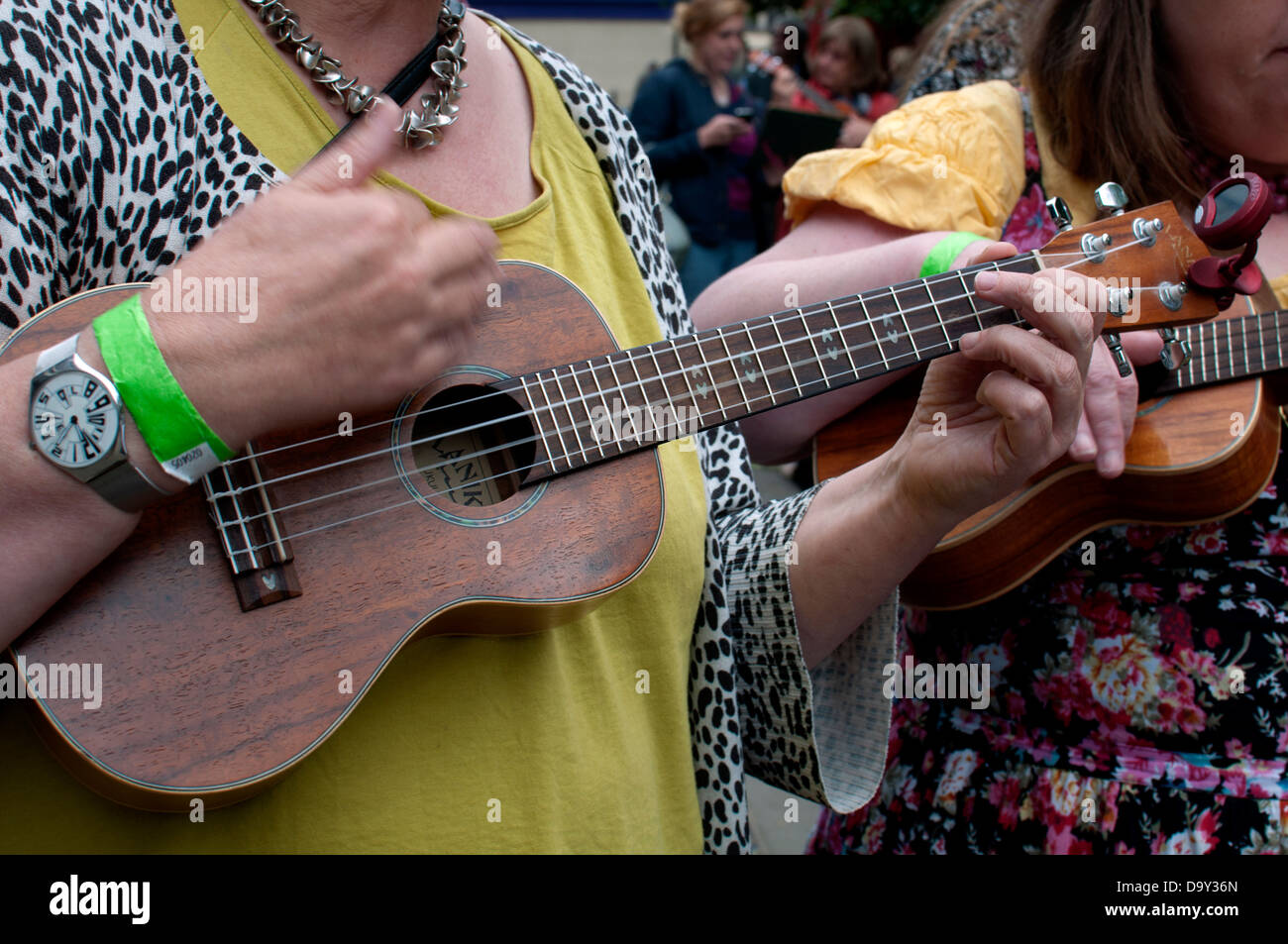 People playing ukuleles Stock Photo - Alamy