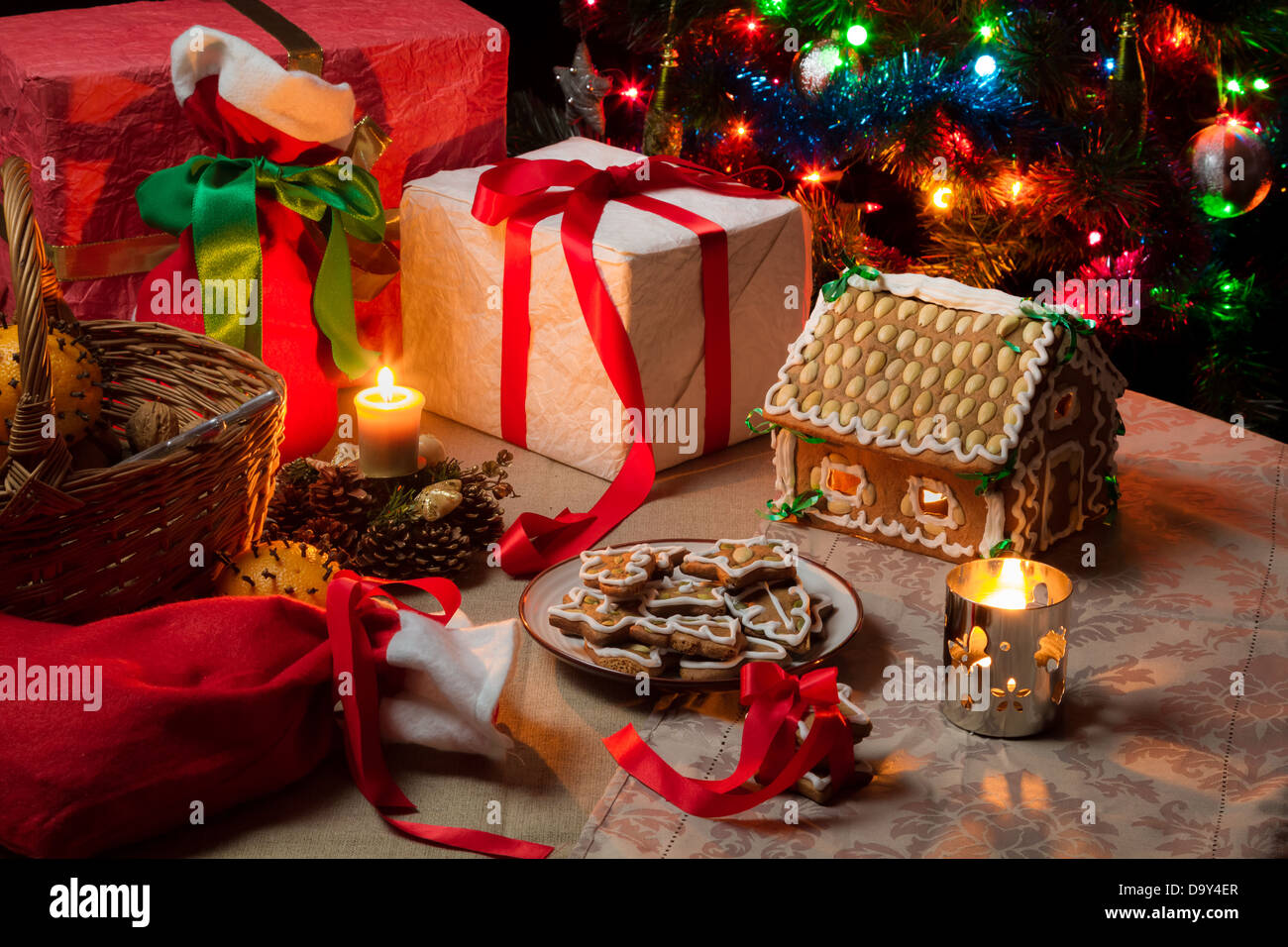 View of the Christmas table with presents and a Christmas tree Stock ...