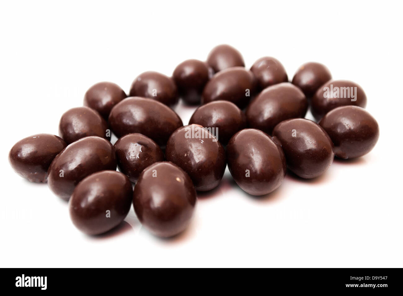 conguitos chocolate on a white background Stock Photo - Alamy